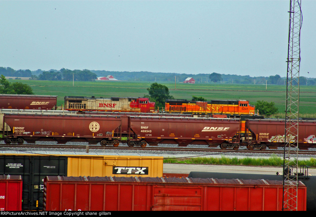 BNSF 5241 Takes a grain train Sb